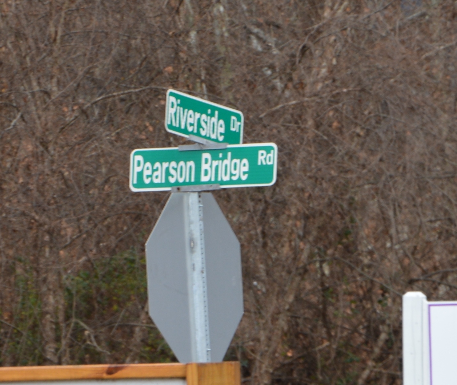 Photo: Street sign at cross roads near marker. Marker is on Riverside Dr.