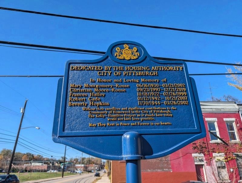 Dedicated by the Housing Authority Historical Marker